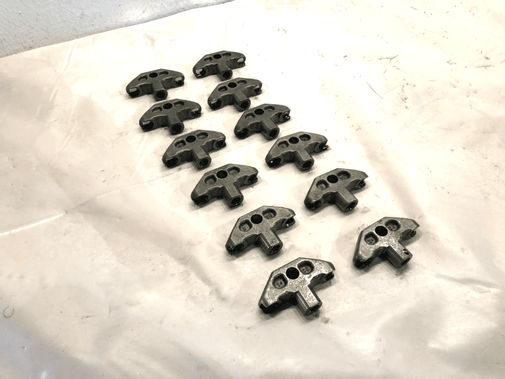 12 x PACCAR MX13 DIESEL ENGINE HEAD CROSSHEAD ROCKER ARM VALVE BRIDGE ...