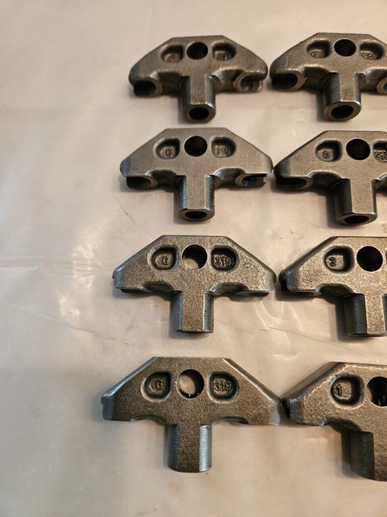 Set of 12 PACCAR MX13 diesel engine crosshead rocker arm valve bridges ...