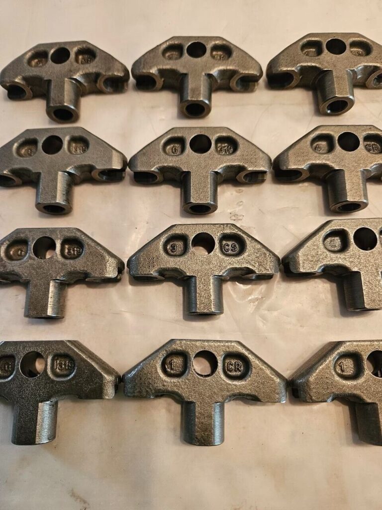 Set of 12 PACCAR MX13 diesel engine crosshead rocker arm valve bridges ...