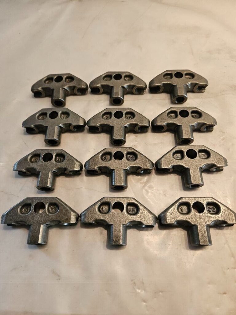 Set of 12 PACCAR MX13 diesel engine crosshead rocker arm valve bridges ...