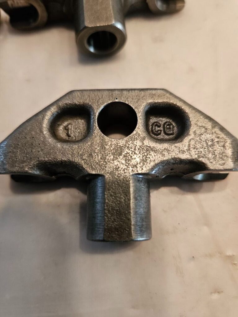 Set of 12 PACCAR MX13 diesel engine crosshead rocker arm valve bridges ...